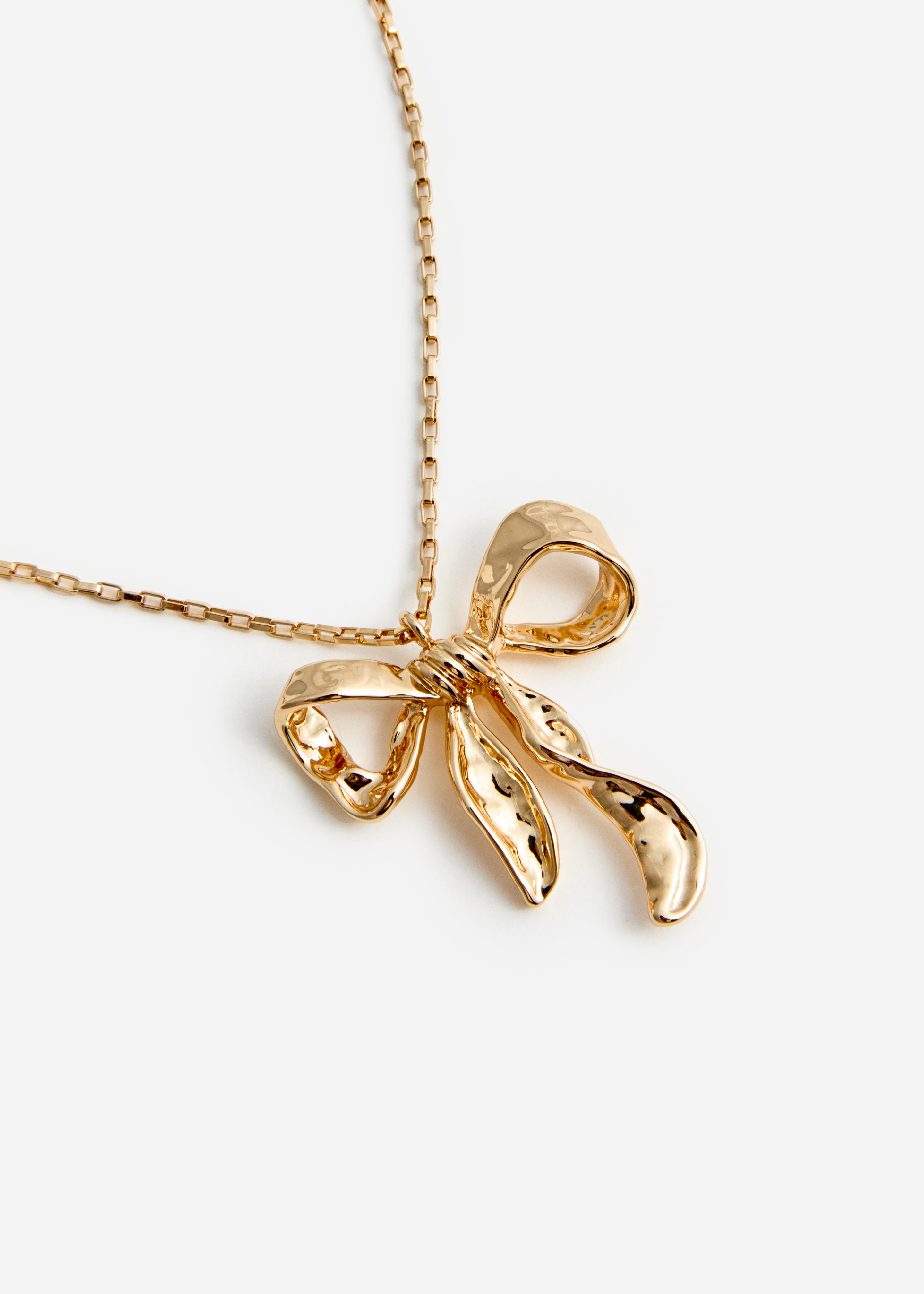 Mottled Gold Bow Pendant Necklace – self-portrait